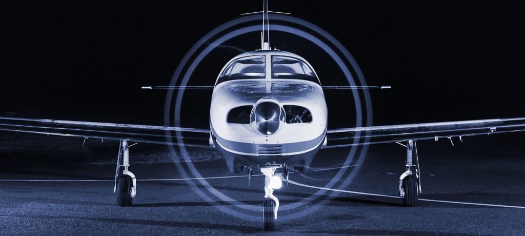 Small private single-engine piston aircraft on runway front view ...